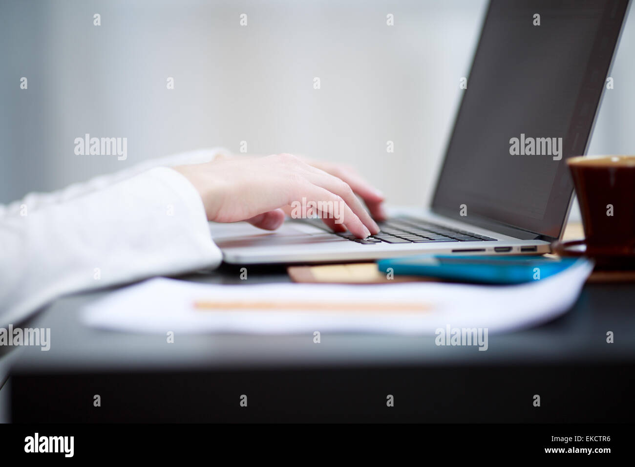 Close-up shot typing on the laptop keyboard Stock Photo - Alamy