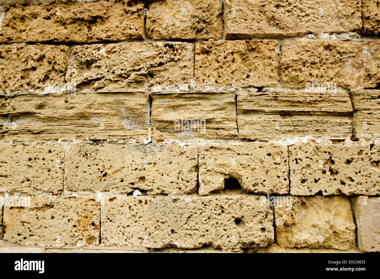 Mares sandstone stone masonry wall in Majorca Stock Photo - Alamy