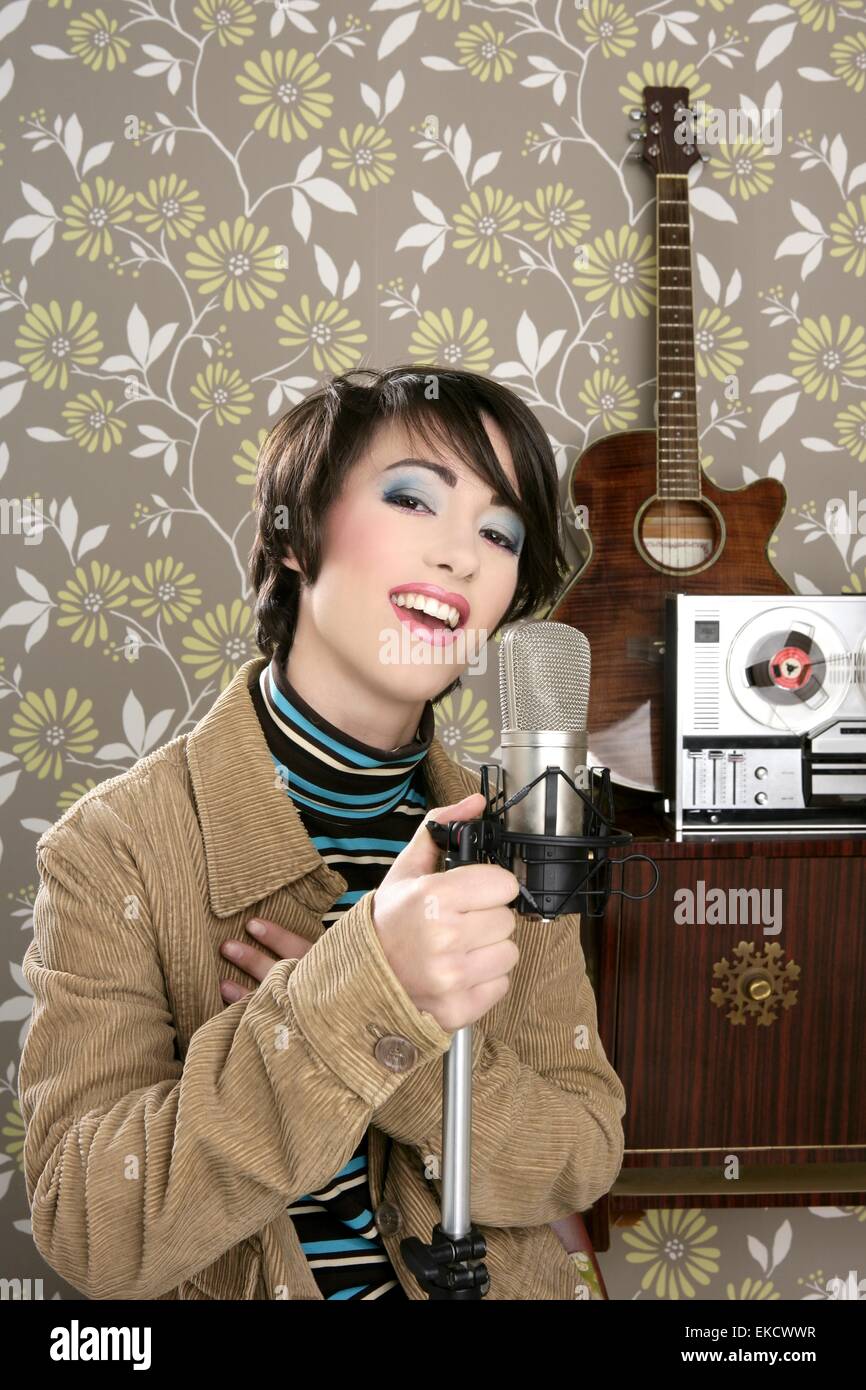retro 60s singer woman microphone guitar reel tape Stock Photo - Alamy