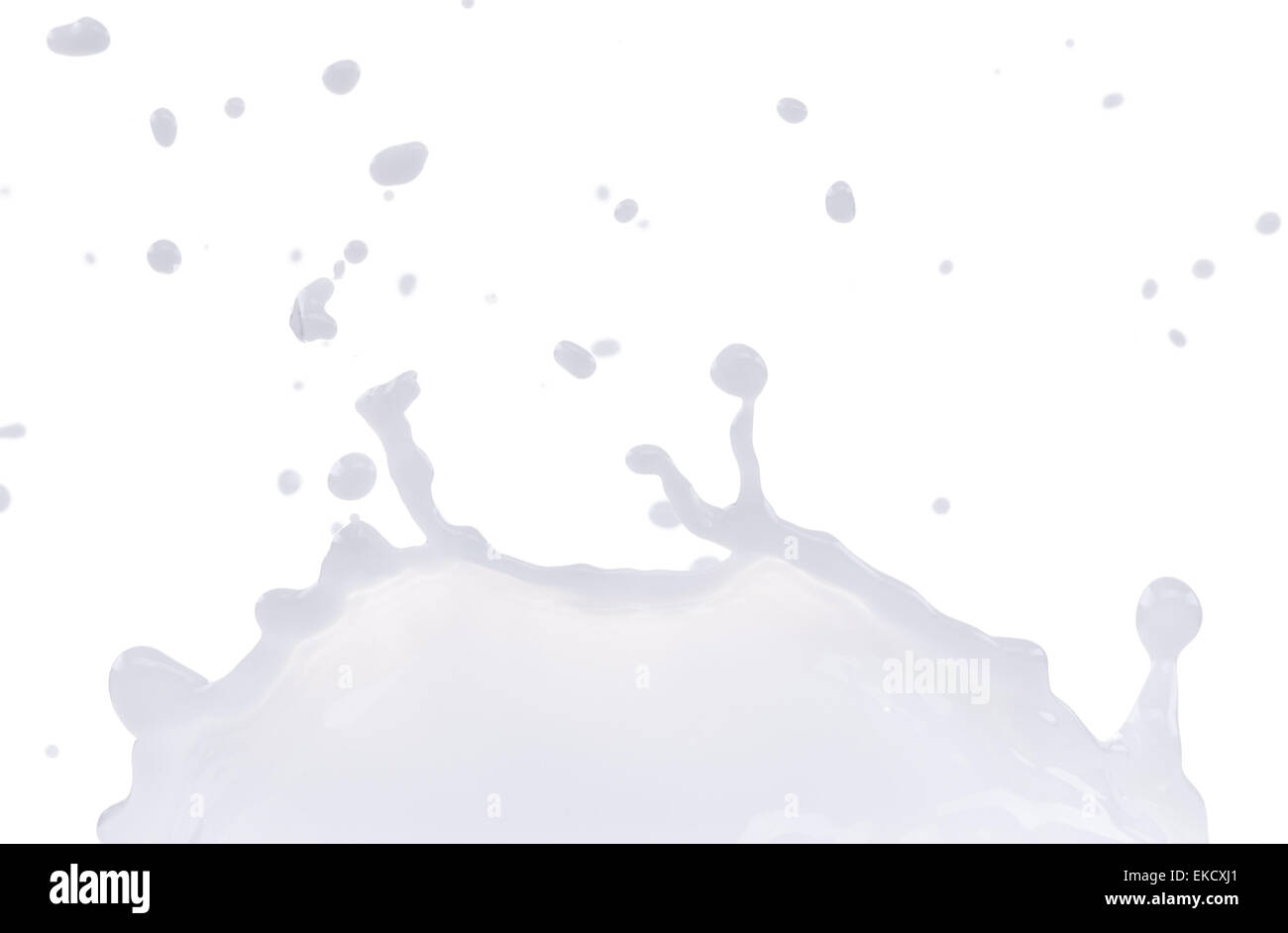 Pouring milk splash on white background Stock Photo - Alamy