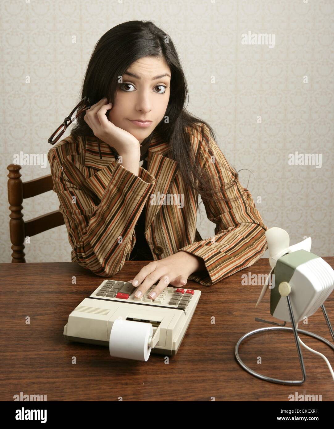 Accountant retro woman calculator negative expression Stock Photo - Alamy