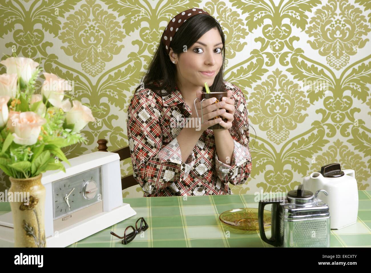 Retro woman drinking cafe on wallpaper kitchen Stock Photo - Alamy