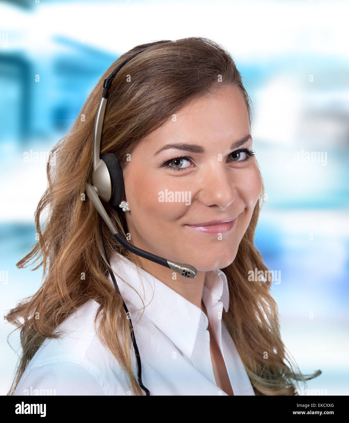 Female customer support operator with headset and smiling Stock Photo - Alamy