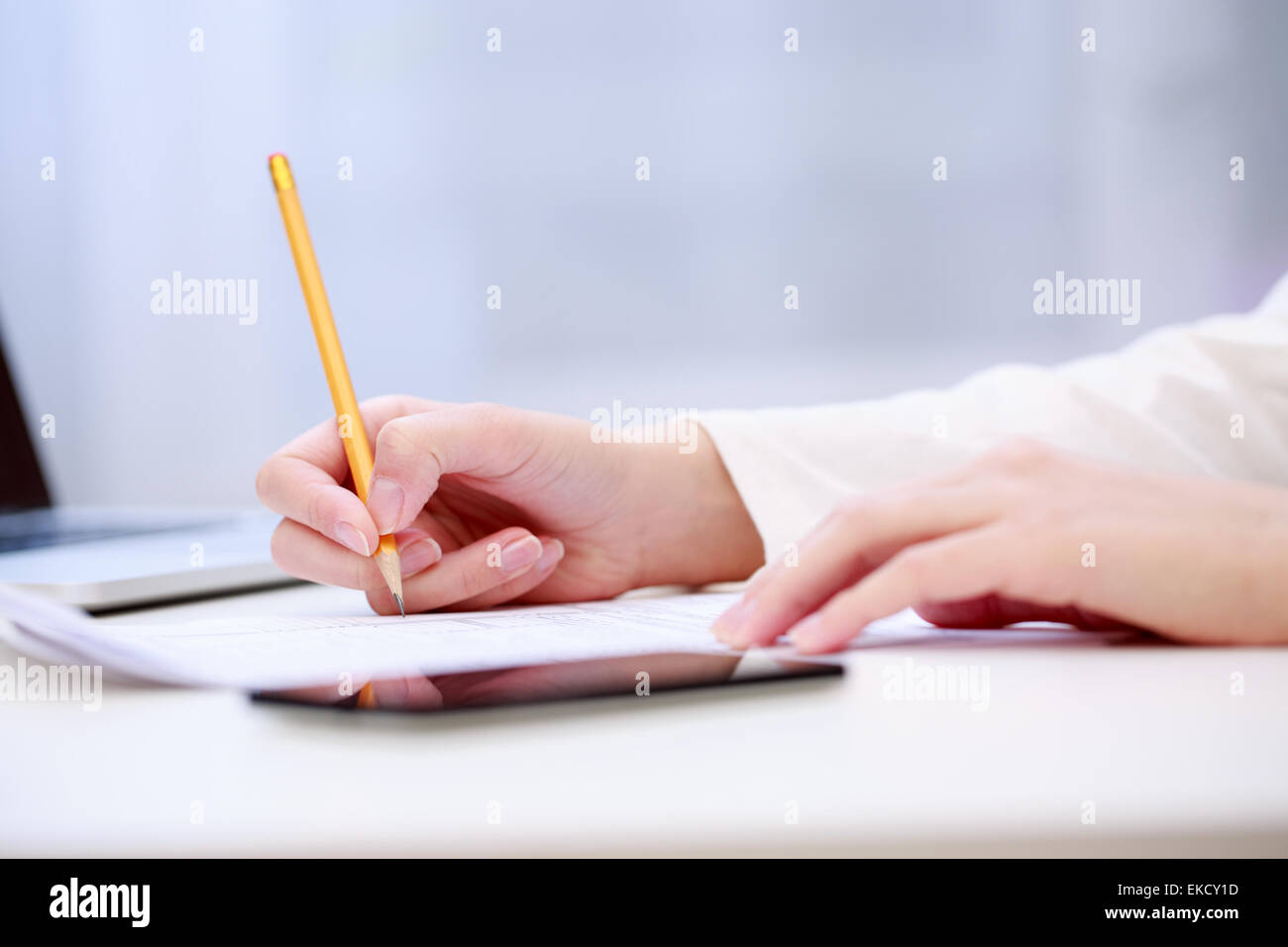 Female hand writing, close up Stock Photo - Alamy