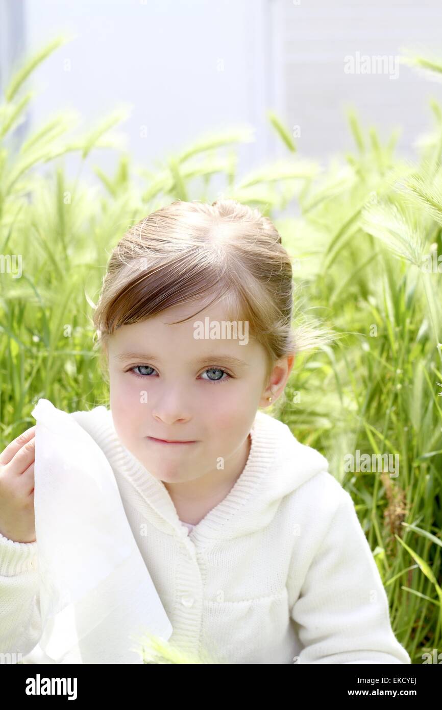 sad little girl crying outdoor green meadow field Stock Photo - Alamy