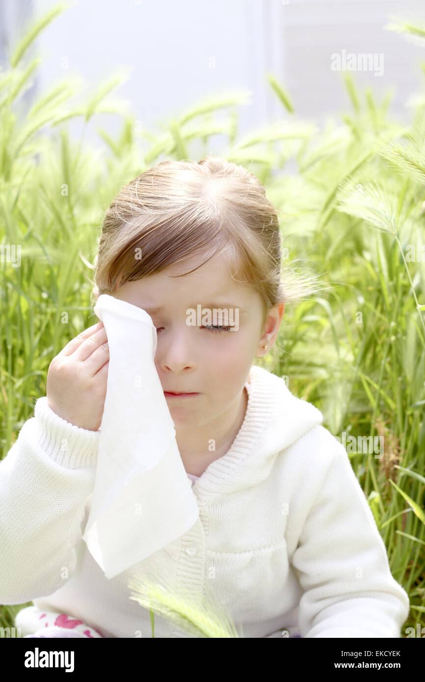 sad little girl crying outdoor green meadow field Stock Photo - Alamy