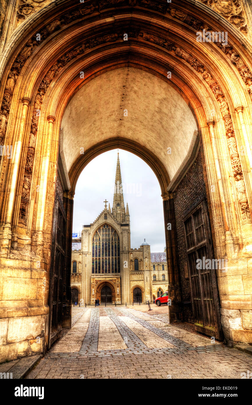 Norwich Cathedral spire building entrance arch gate window facade ...