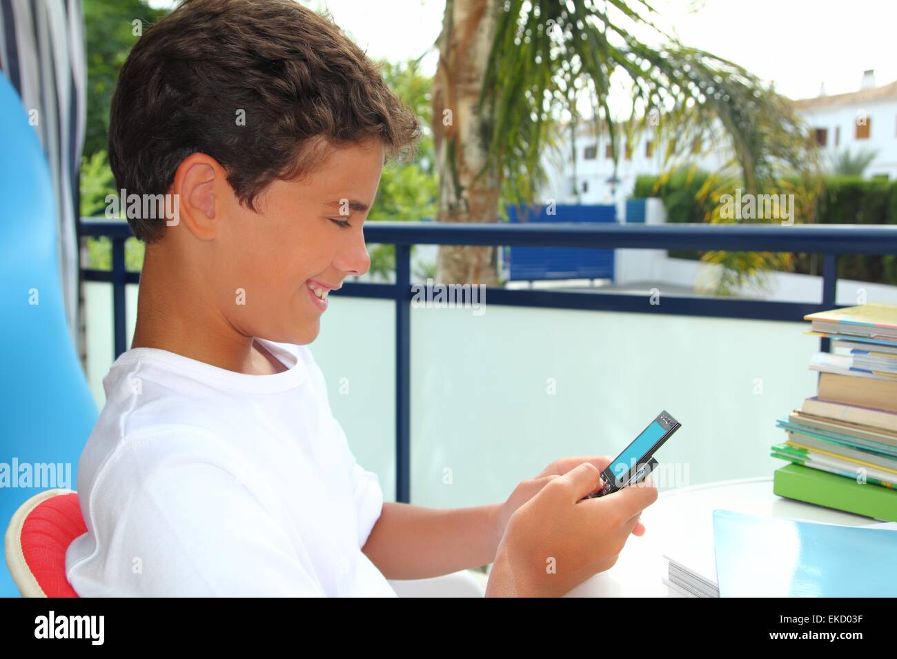 Teenager student boy sms message on moblile Stock Photo - Alamy