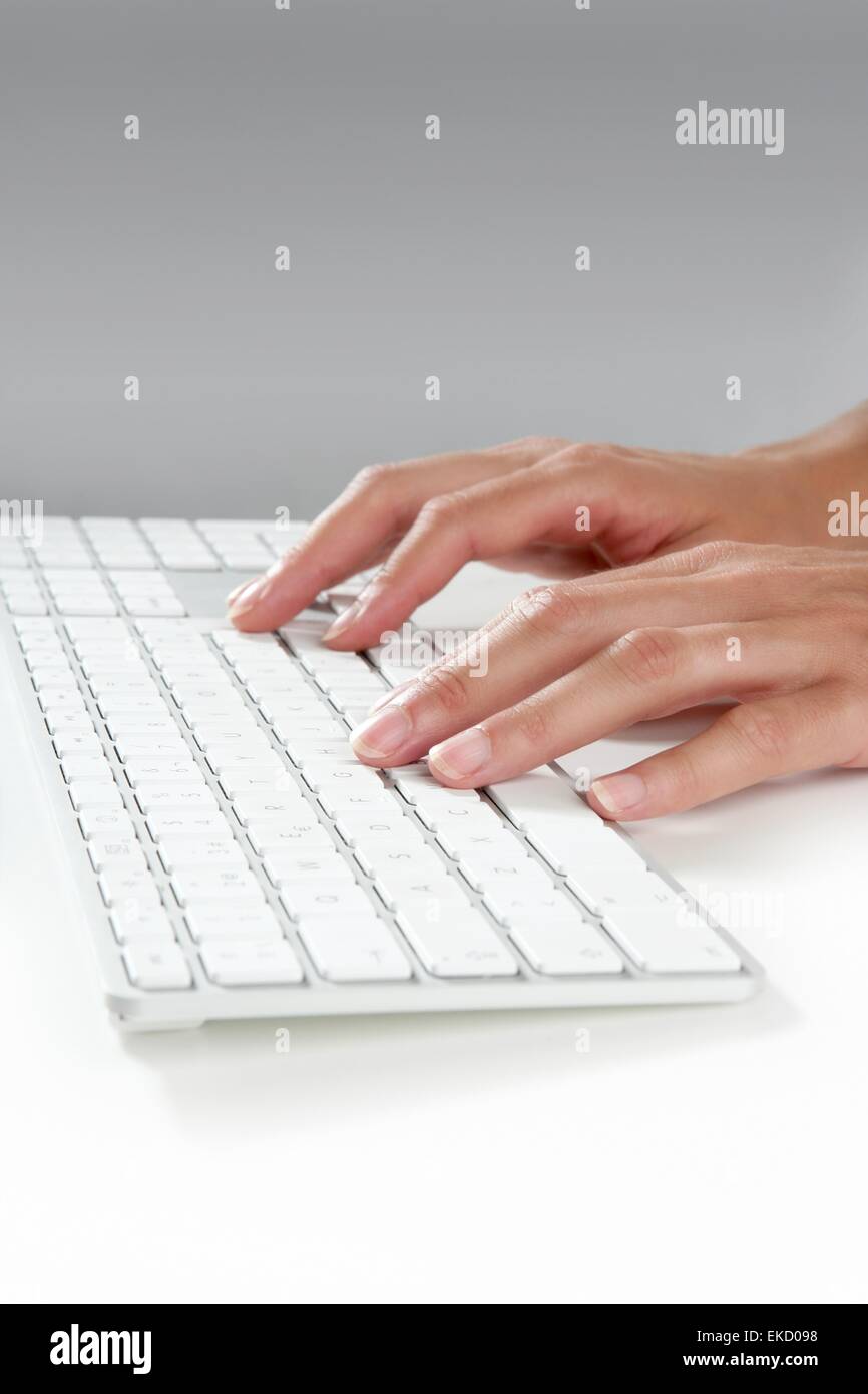 woman hands typing keyboard Stock Photo - Alamy