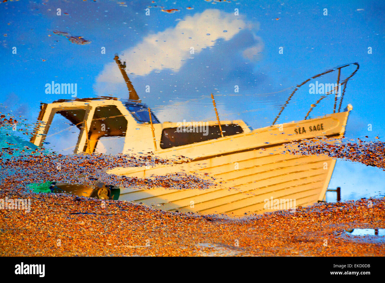Painterly effect of Sea Sage boat reflection in puddle at Calshot in ...