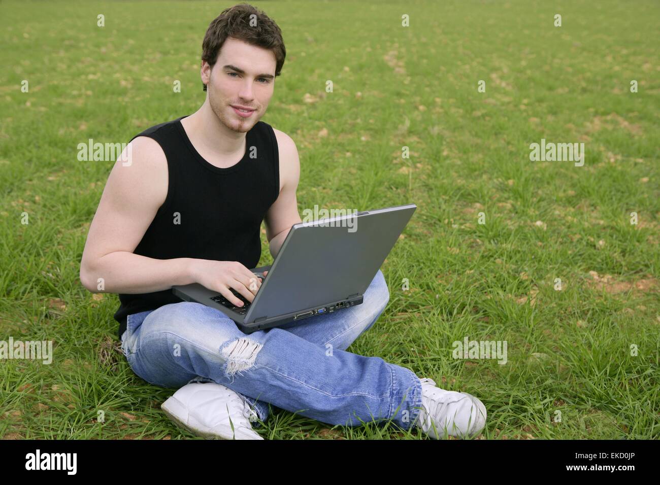 student young man laptop computer on meadow Stock Photo - Alamy student young man laptop computer on meadow Stock Photo - Alamy