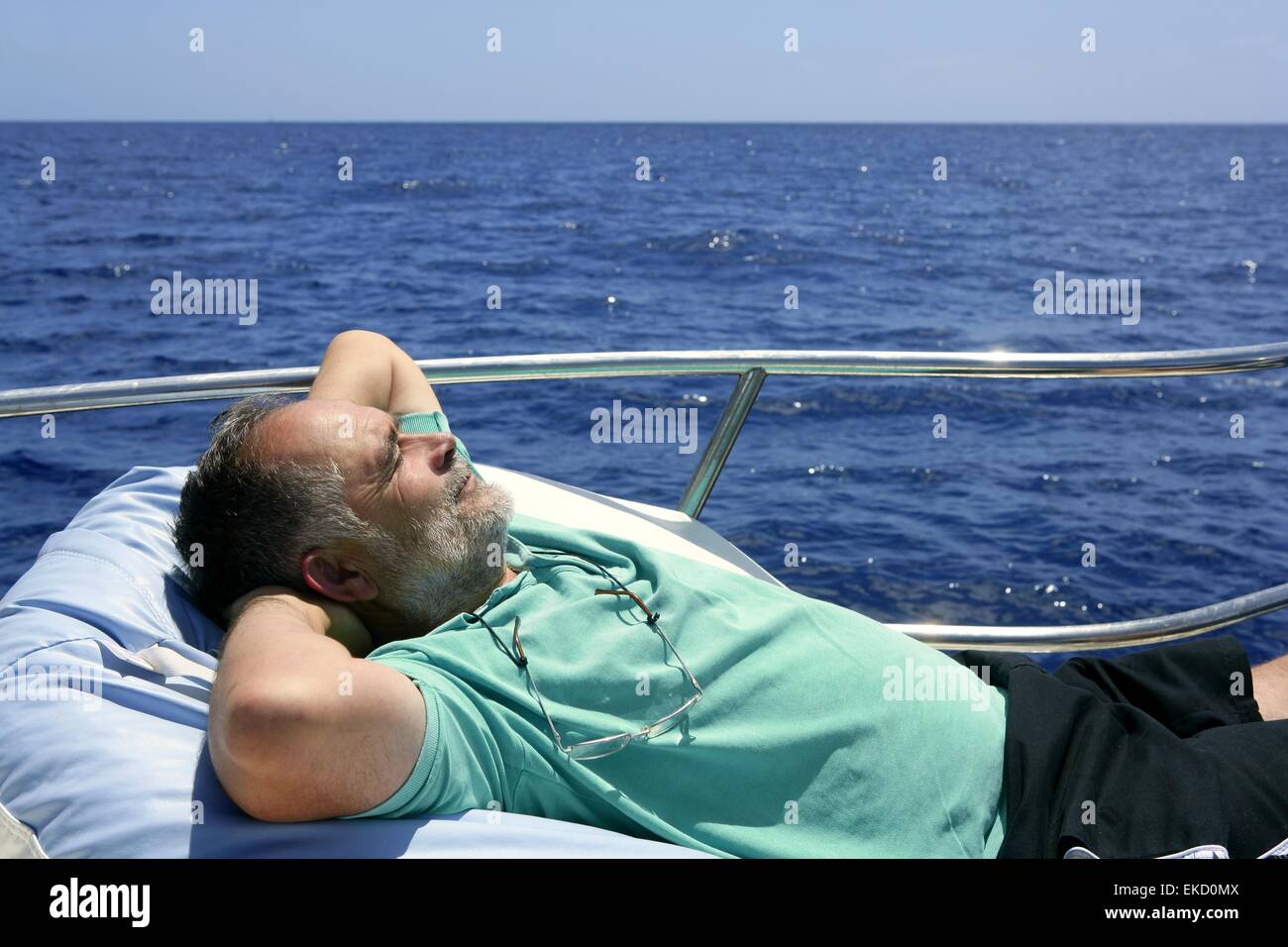 Male enjoying rest on sailboat hi-res stock photography and images - Alamy