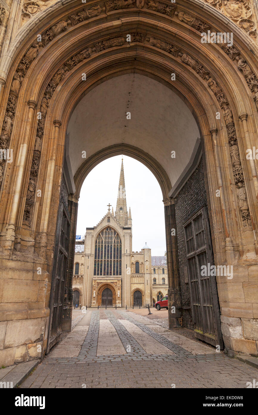Norwich Cathedral spire building entrance arch gate window facade ...
