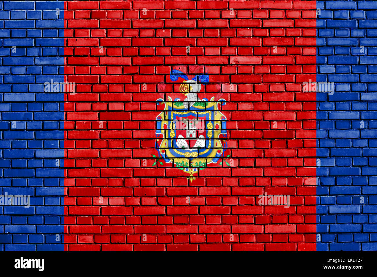 flag of Quito painted on brick wall Stock Photo - Alamy