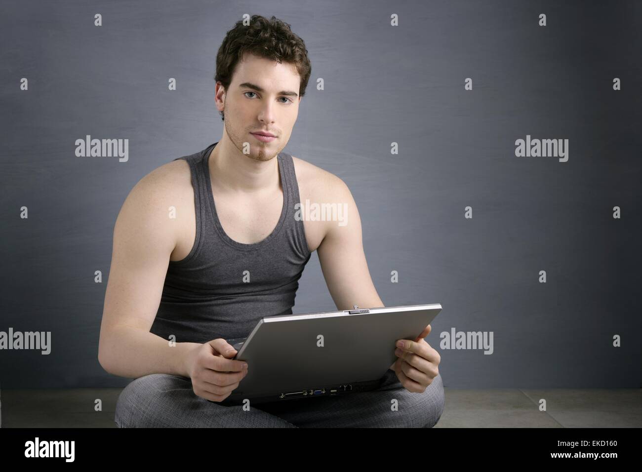 handsome student young man sit working laptop Stock Photo - Alamy