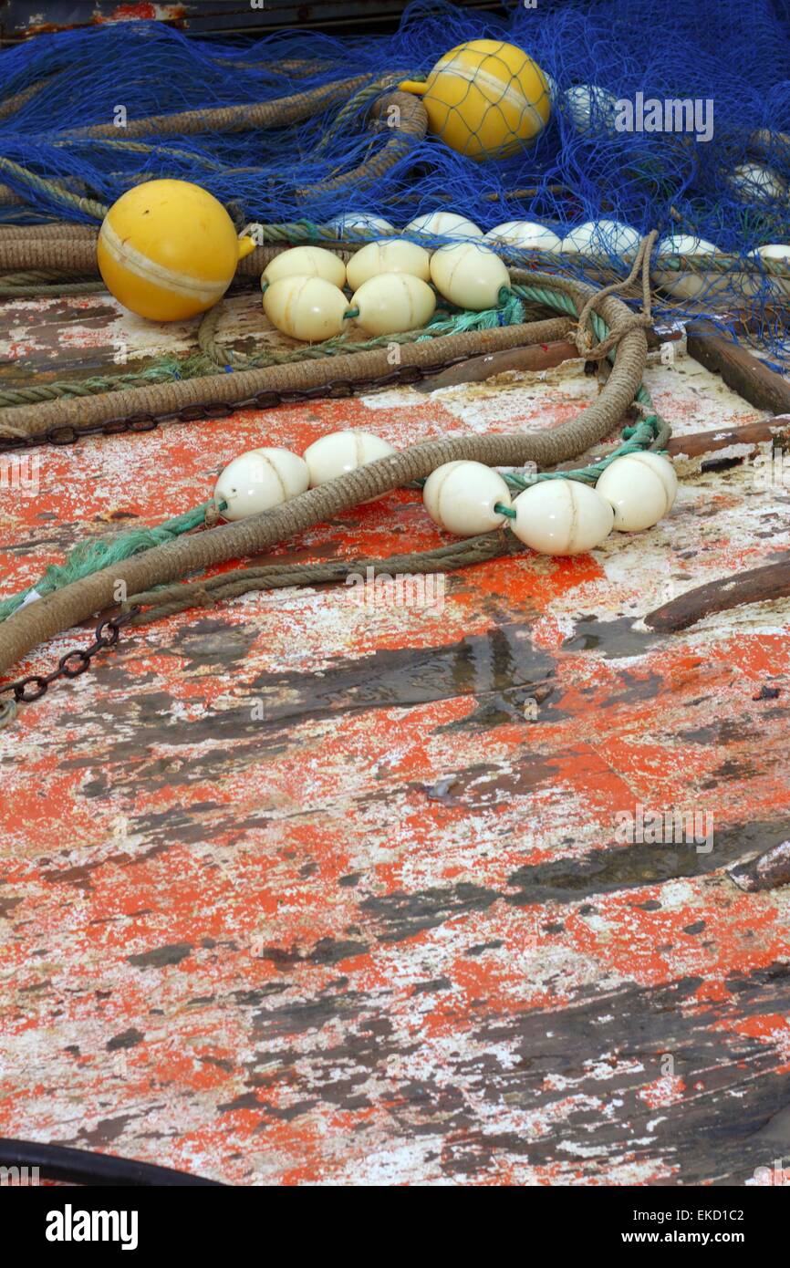 fishemen professional tackle net boat wood deck Stock Photo - Alamy