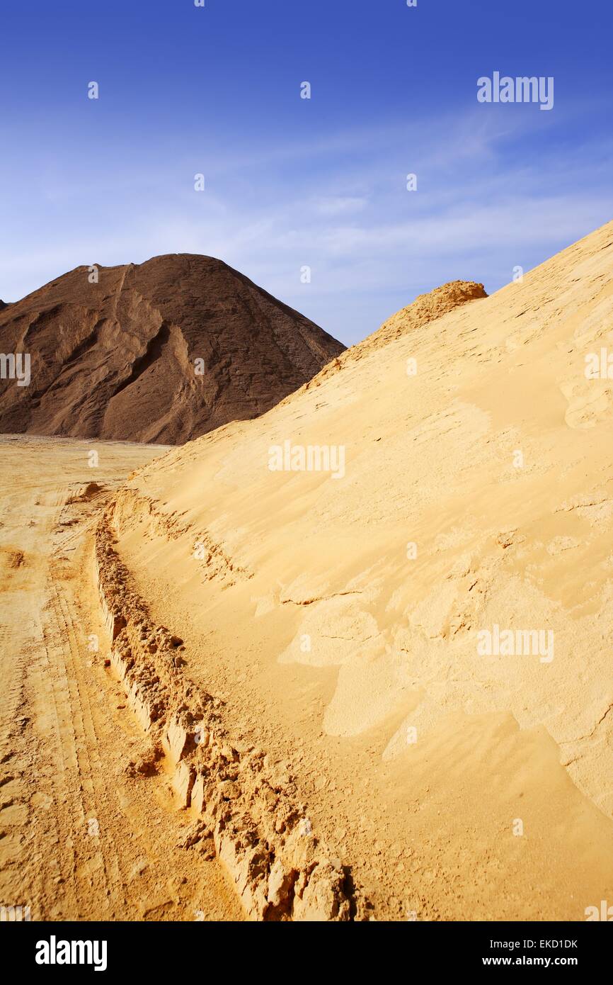 sand quarry mounds of varied sands color Stock Photo - Alamy