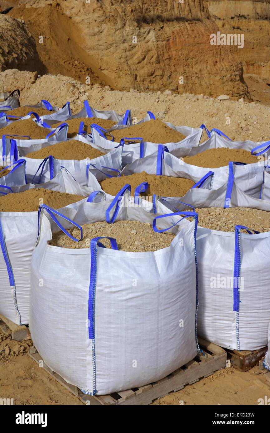 sandbag white big bag sand sacks quarry Stock Photo - Alamy