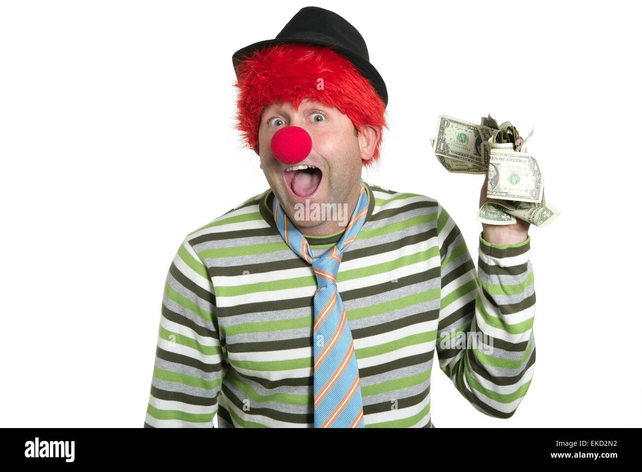 Clown with many dollar notes in hand Stock Photo - Alamy