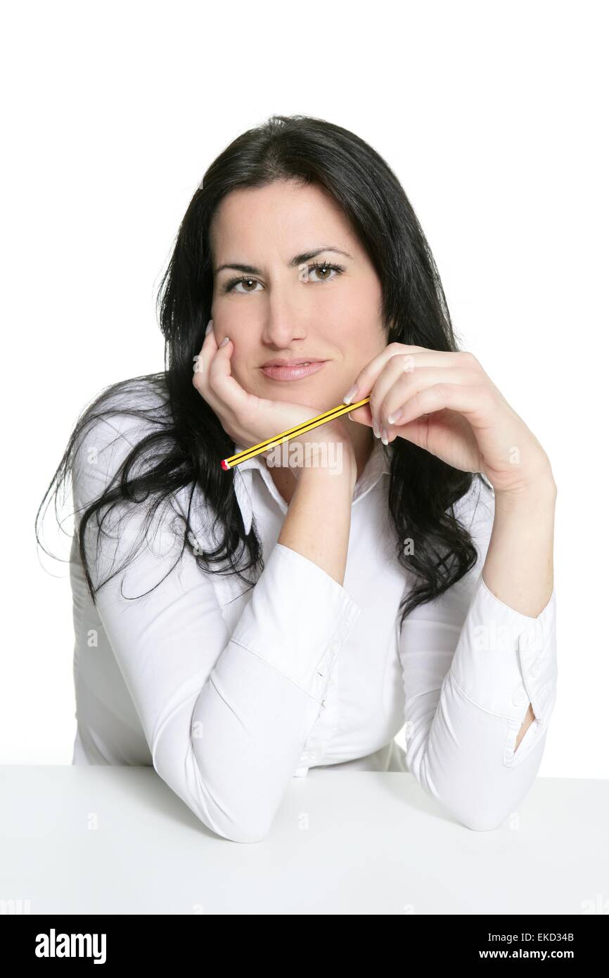 Brunette woman thinking with pencil Stock Photo - Alamy