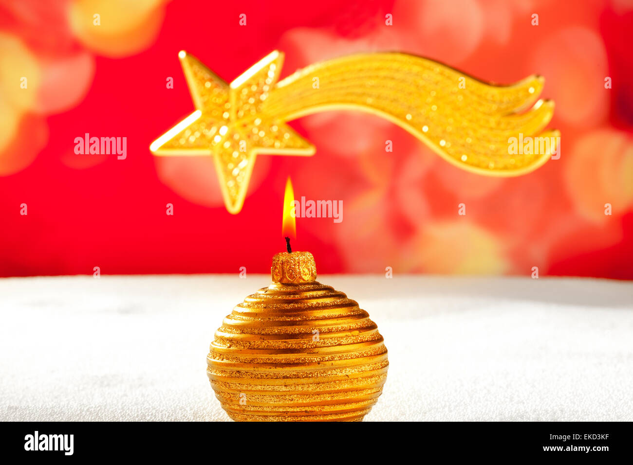 Christmas golden candle and bethlehem star Stock Photo - Alamy