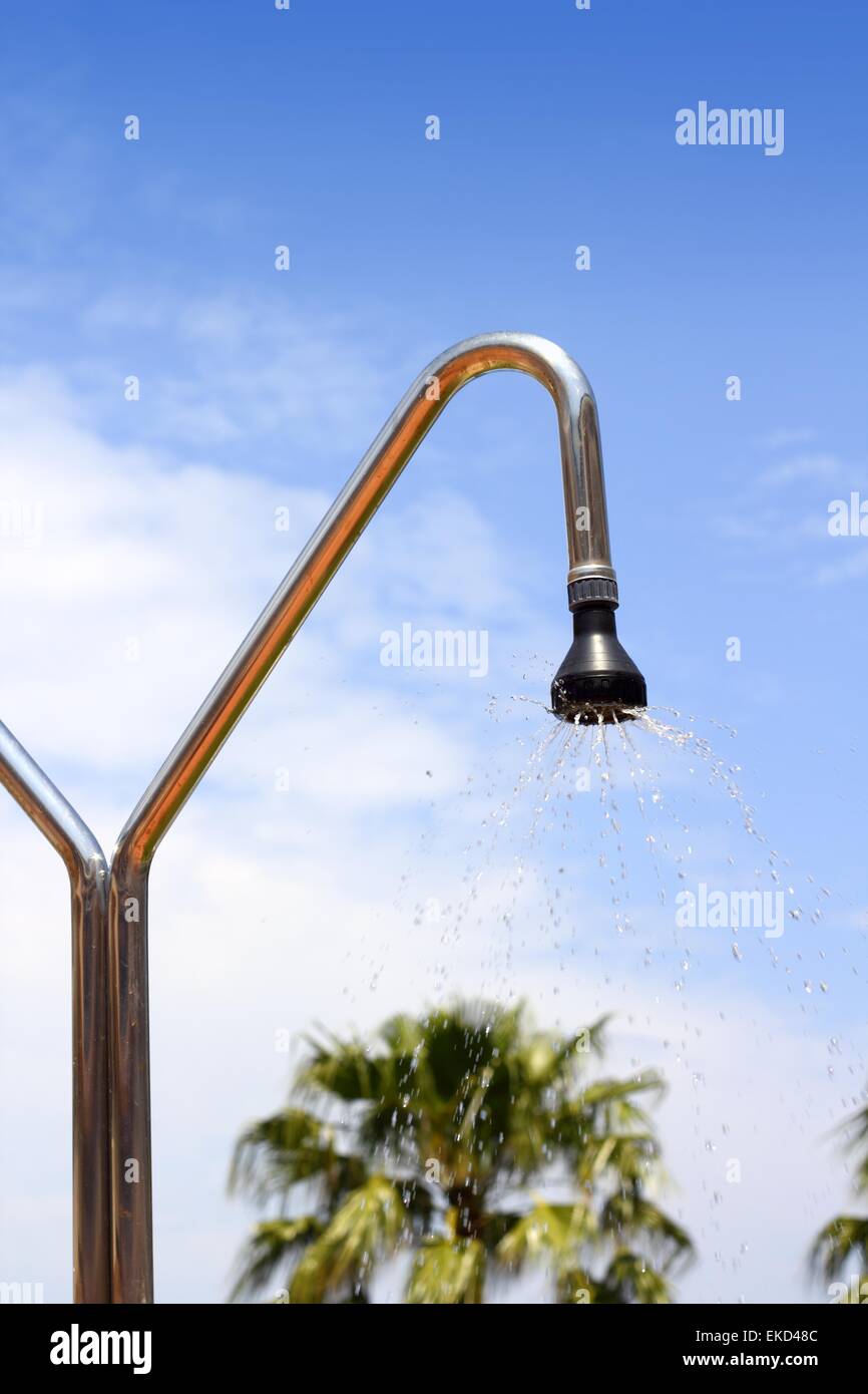 shower sprinkler on blue sky outdoor water falling Stock Photo - Alamy