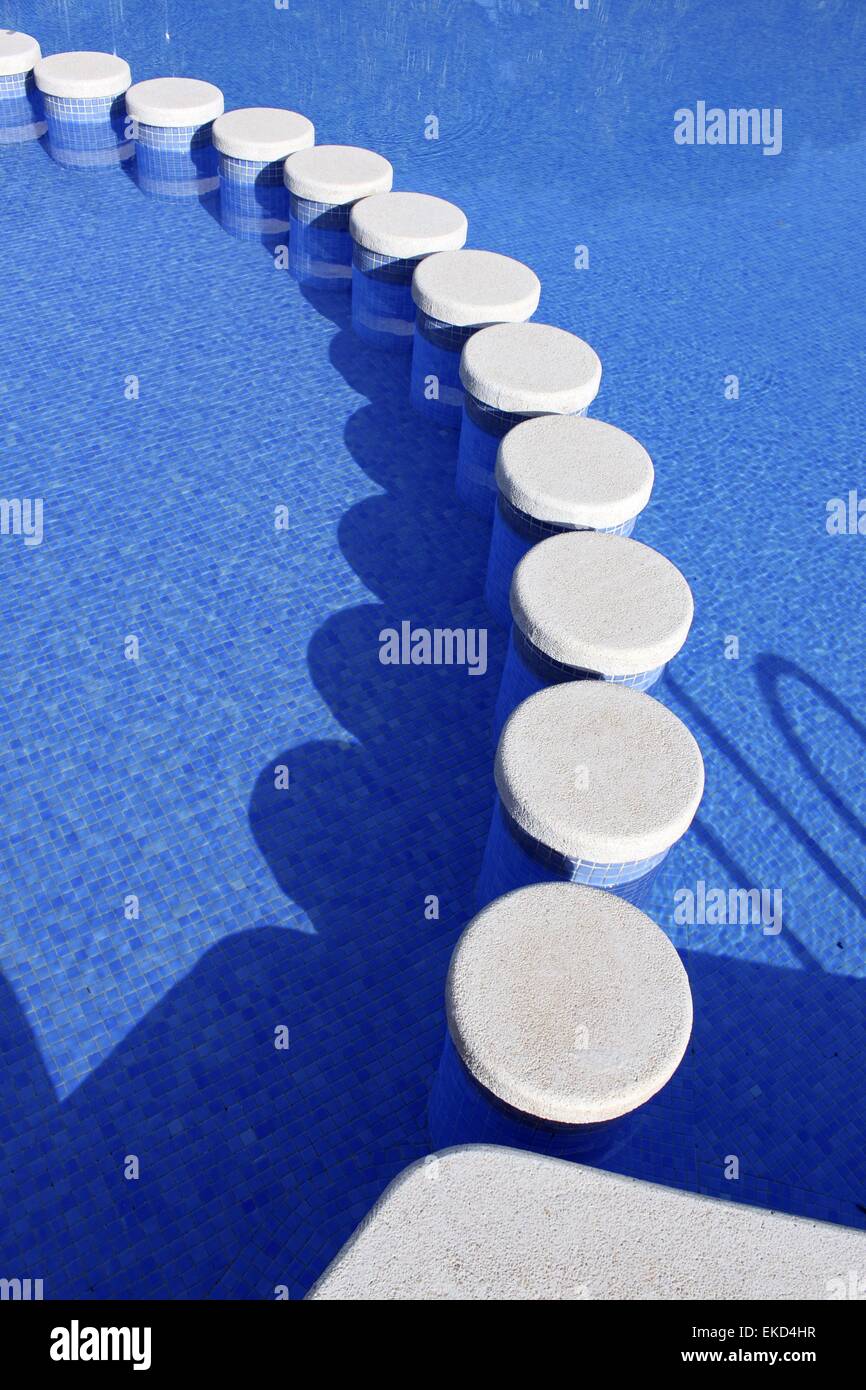 blue swimming pool round tiles way Stock Photo - Alamy