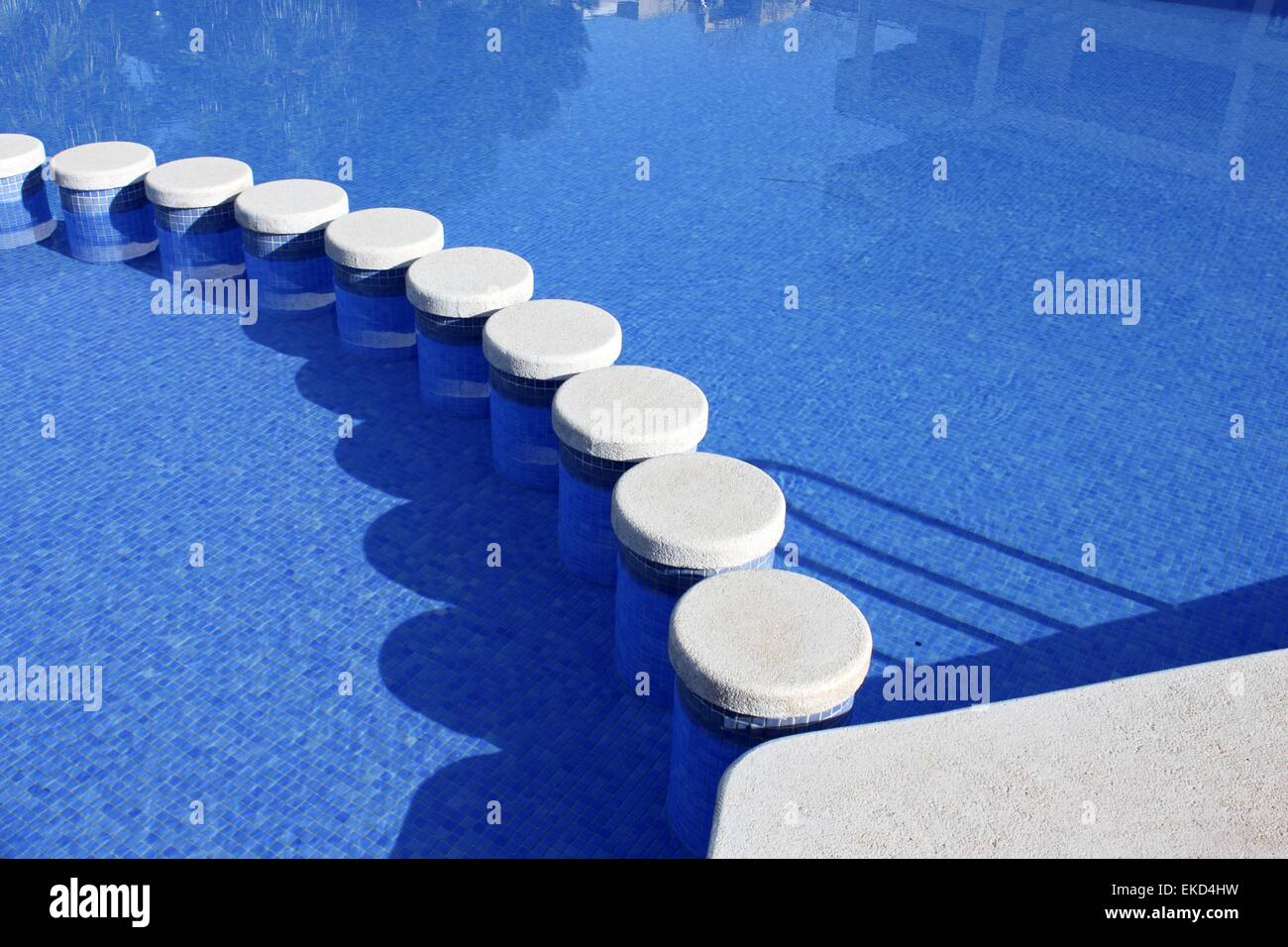 blue swimming pool round tiles way Stock Photo - Alamy