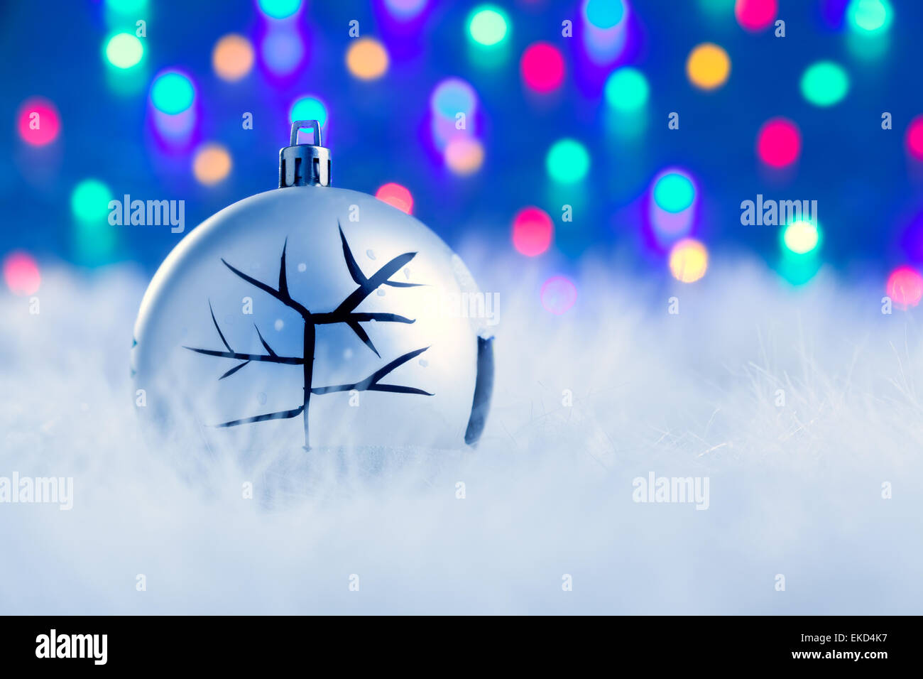 Christmas babule in silver with tree and lights Stock Photo - Alamy