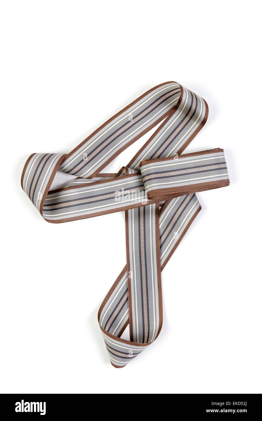 trimming loop tape in warm colors Stock Photo - Alamy