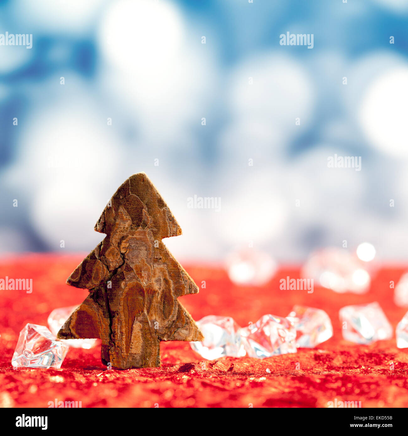 Christmas bark tree shape on ice cubes Stock Photo - Alamy
