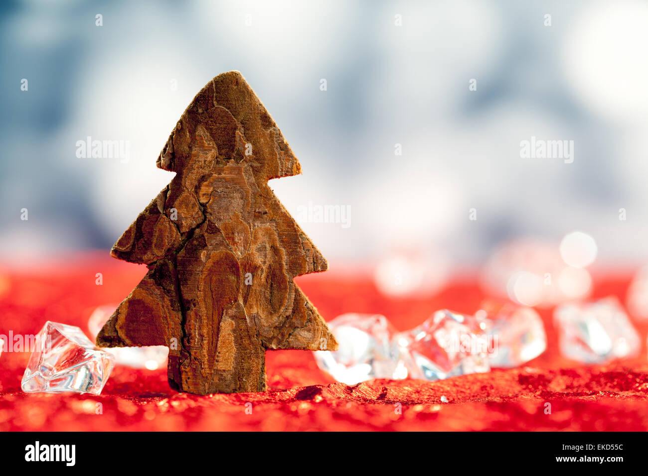 Christmas bark tree shape on ice cubes Stock Photo - Alamy