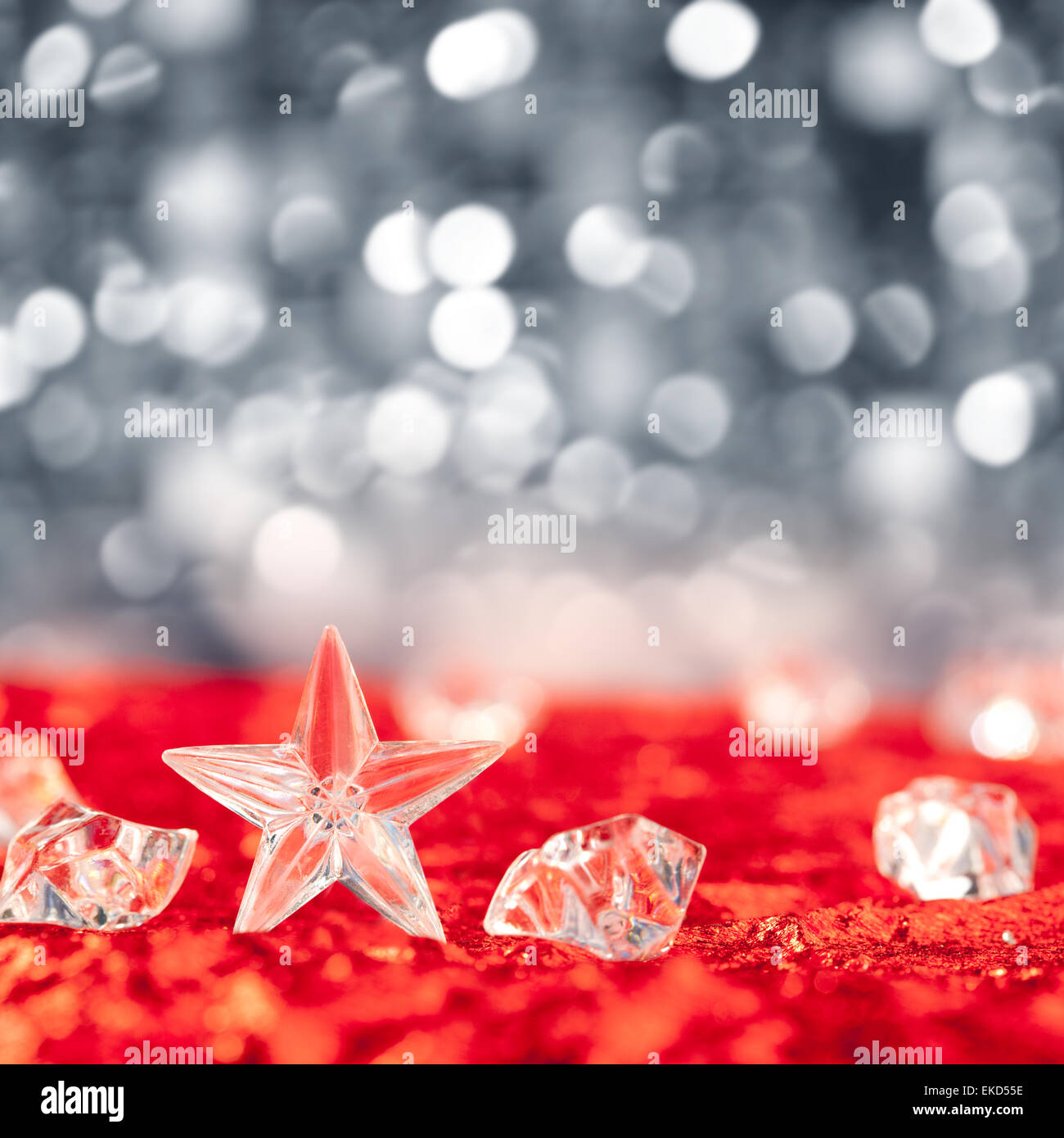 Christmas crystal star on ice cubes Stock Photo - Alamy