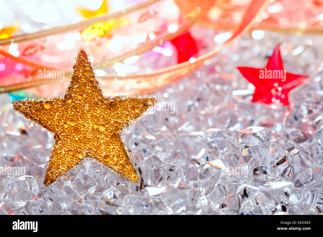 christmas stars in ice background Stock Photo - Alamy