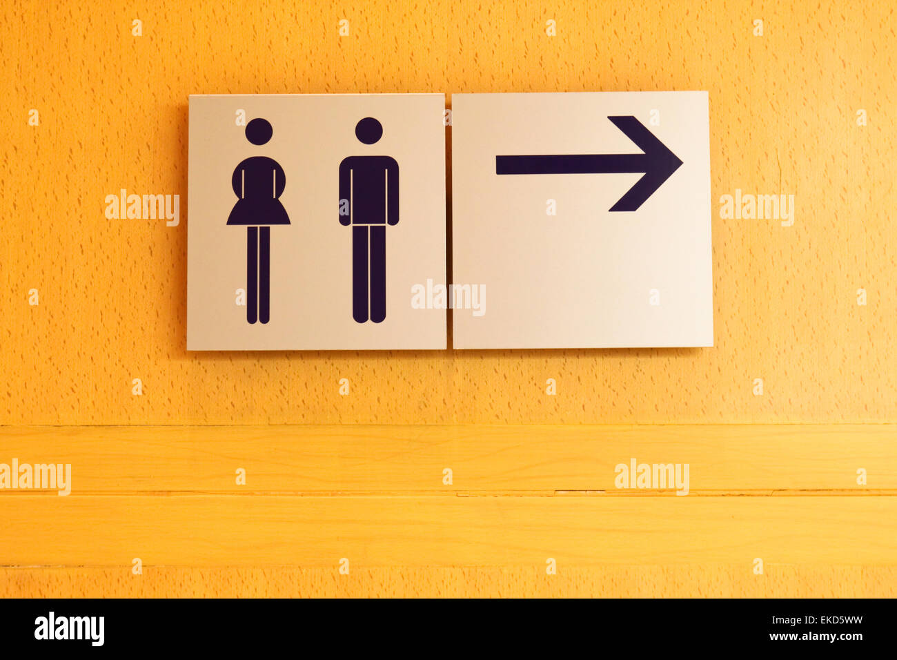 Toilet sign and direction on wood wall Stock Photo - Alamy