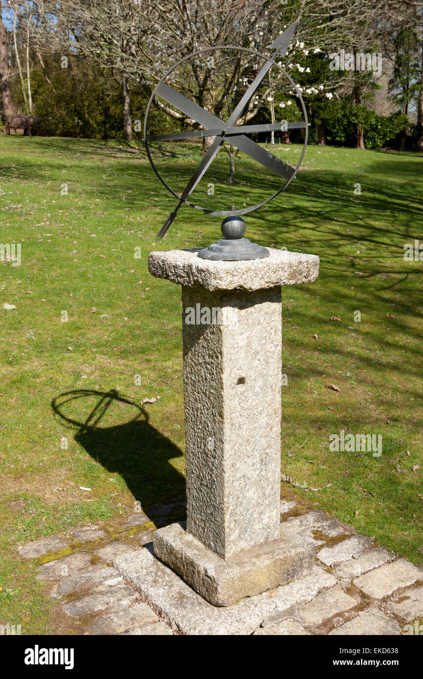A sundial in the gardens of Pinetum Park in Cornwall on a spring day ...