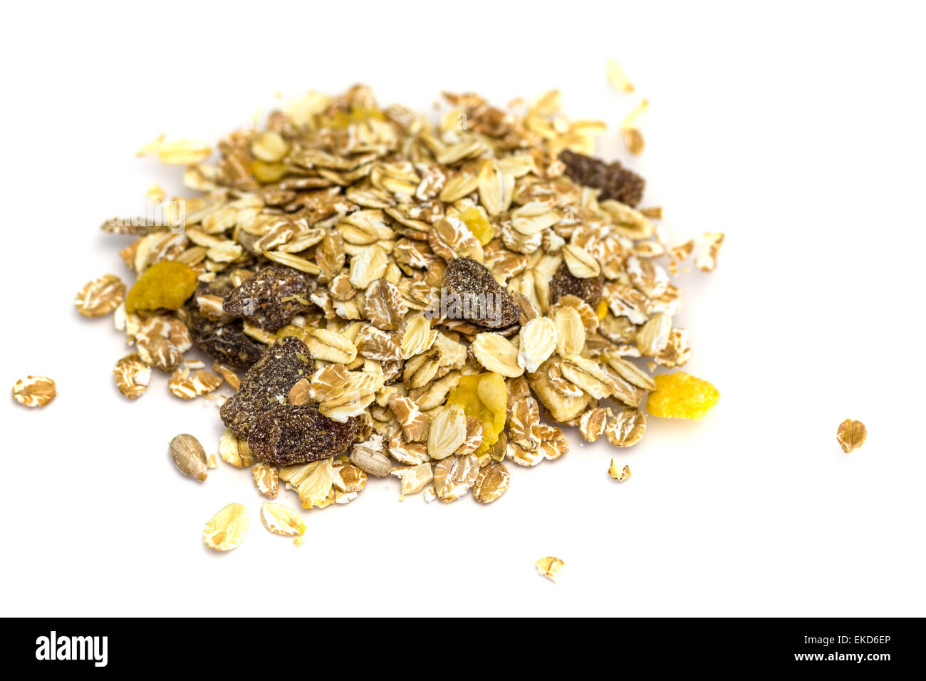 Heap of muesli isolated on white. Delicious granola cereal mix, with ...