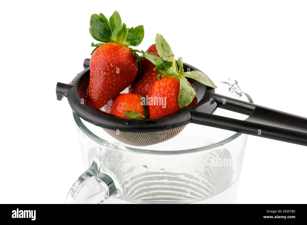 Colander with strawberry Stock Photo - Alamy