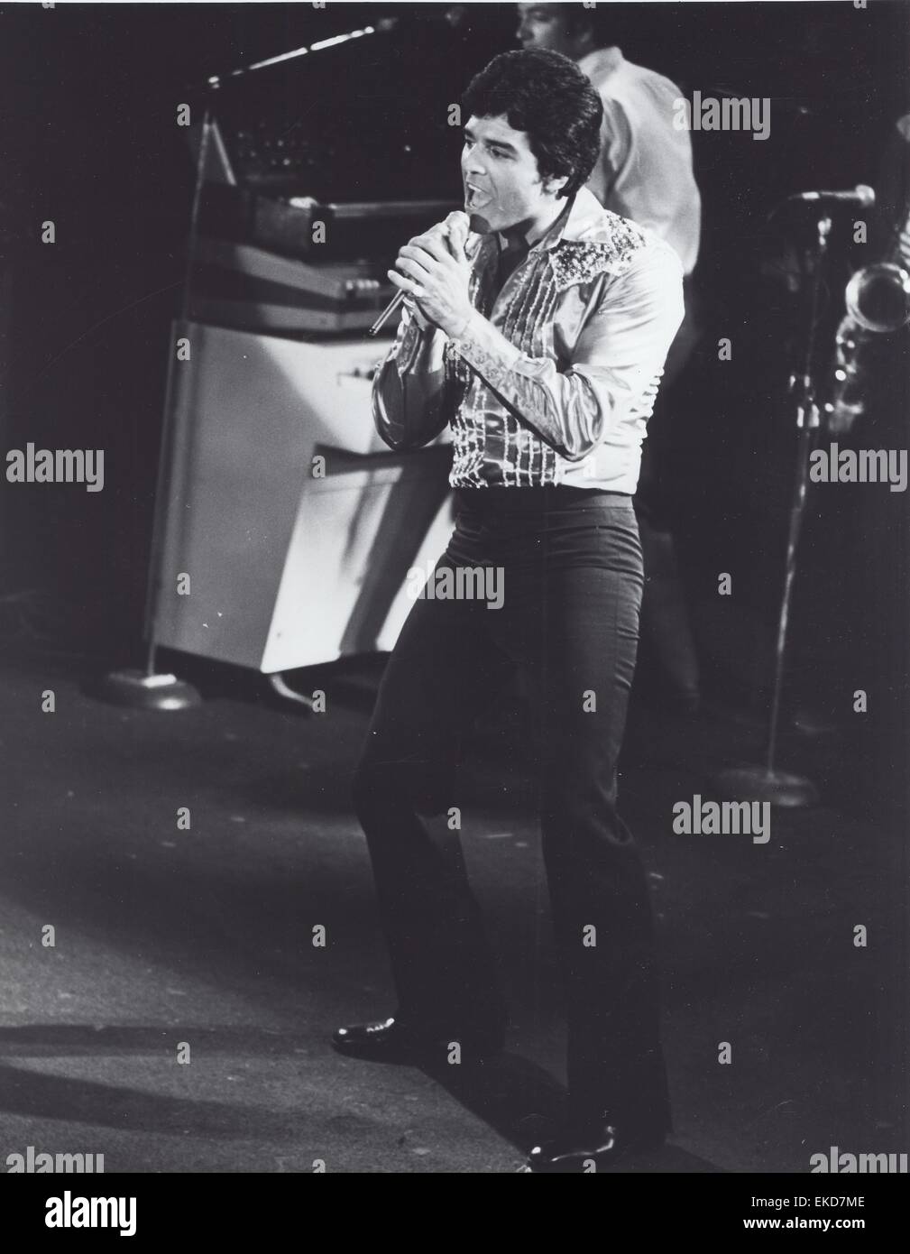ERIK ESTRADA poses as a nightclub singer for a episode of Chips ...