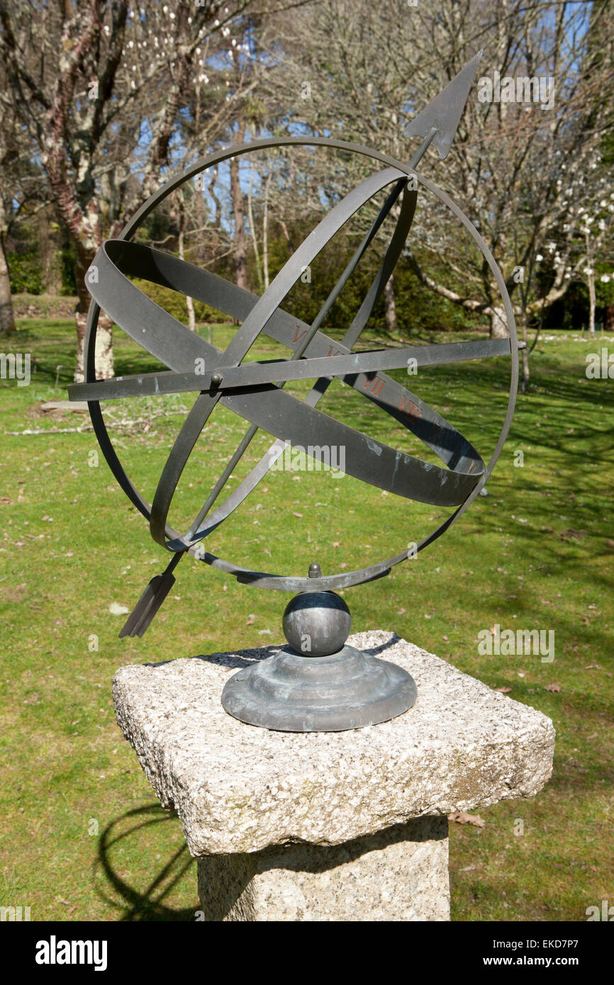 A sundial in the gardens of Pinetum Park in Cornwall on a spring day ...