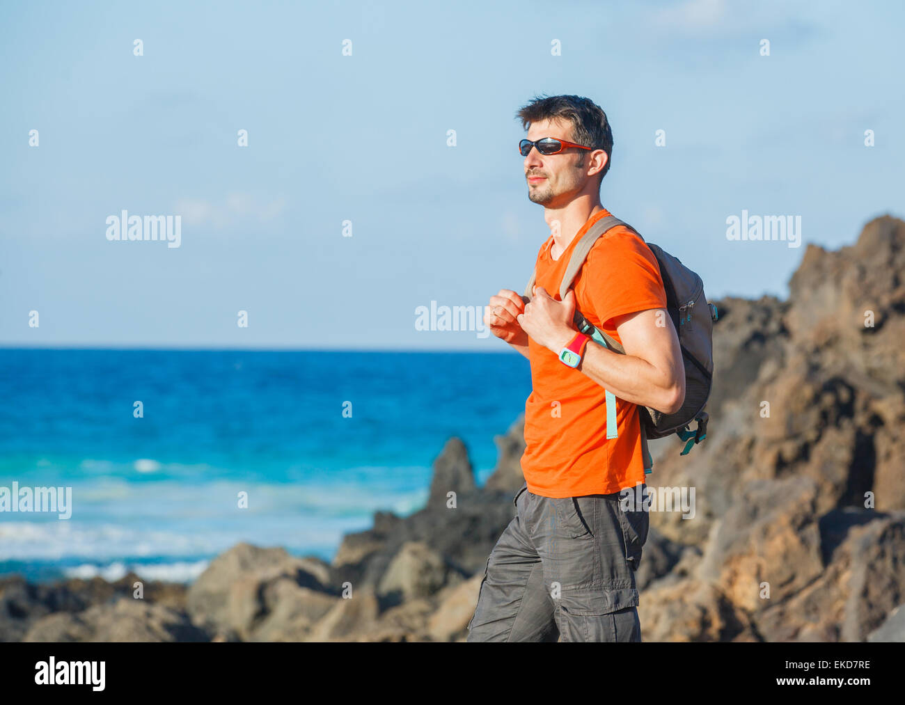 portrait young man with backpack Stock Photo - Alamy