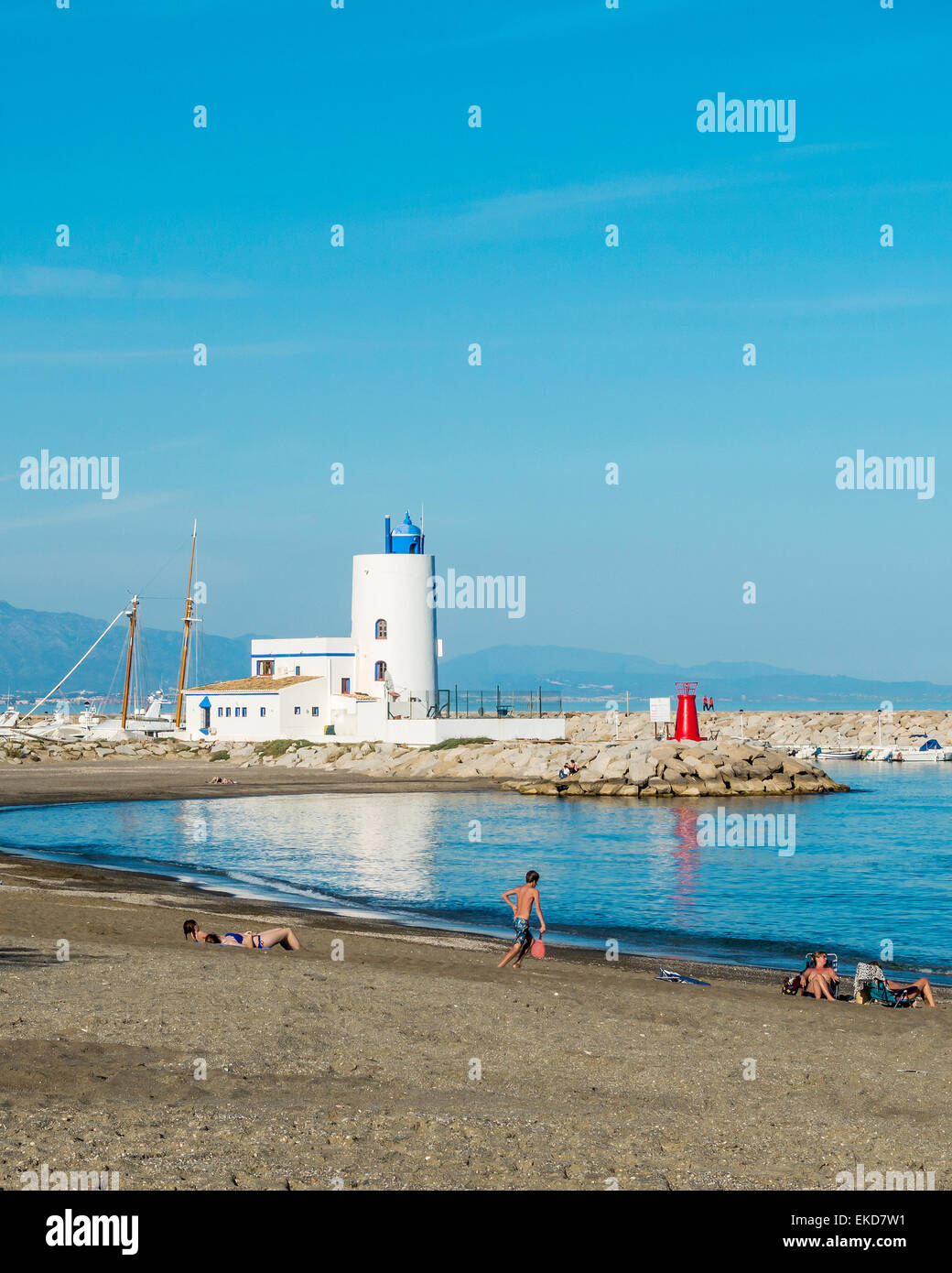 Puerto de la Duquesa Beach and Lighthouse Spain Stock Photo - Alamy
