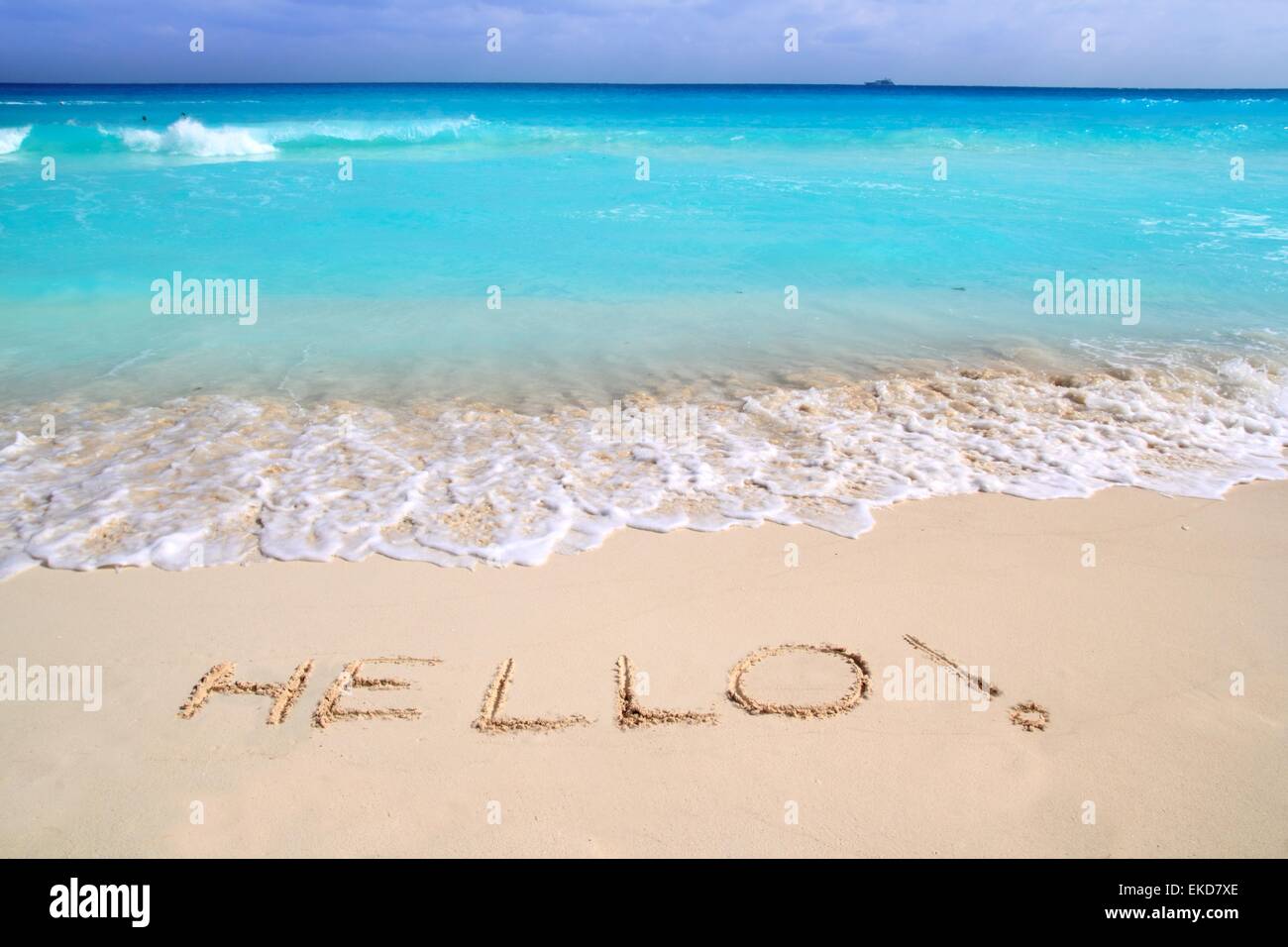 Hello message spell written in tropical beach sand Stock Photo - Alamy
