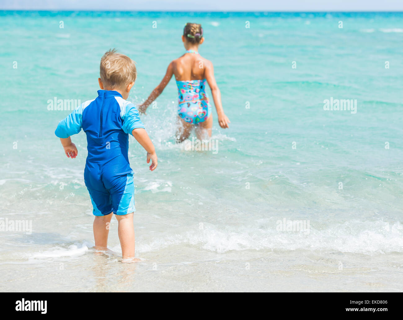 Happy children on beach Stock Photo - Alamy