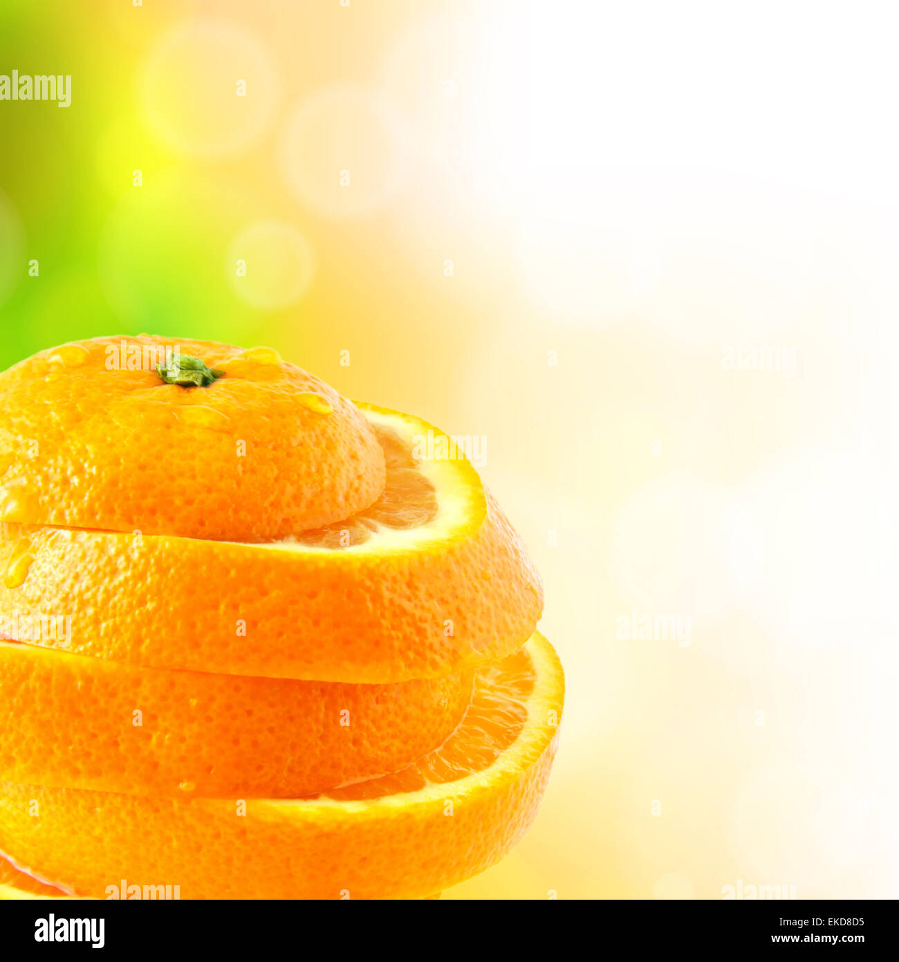 juicy orange cut into slices Stock Photo - Alamy