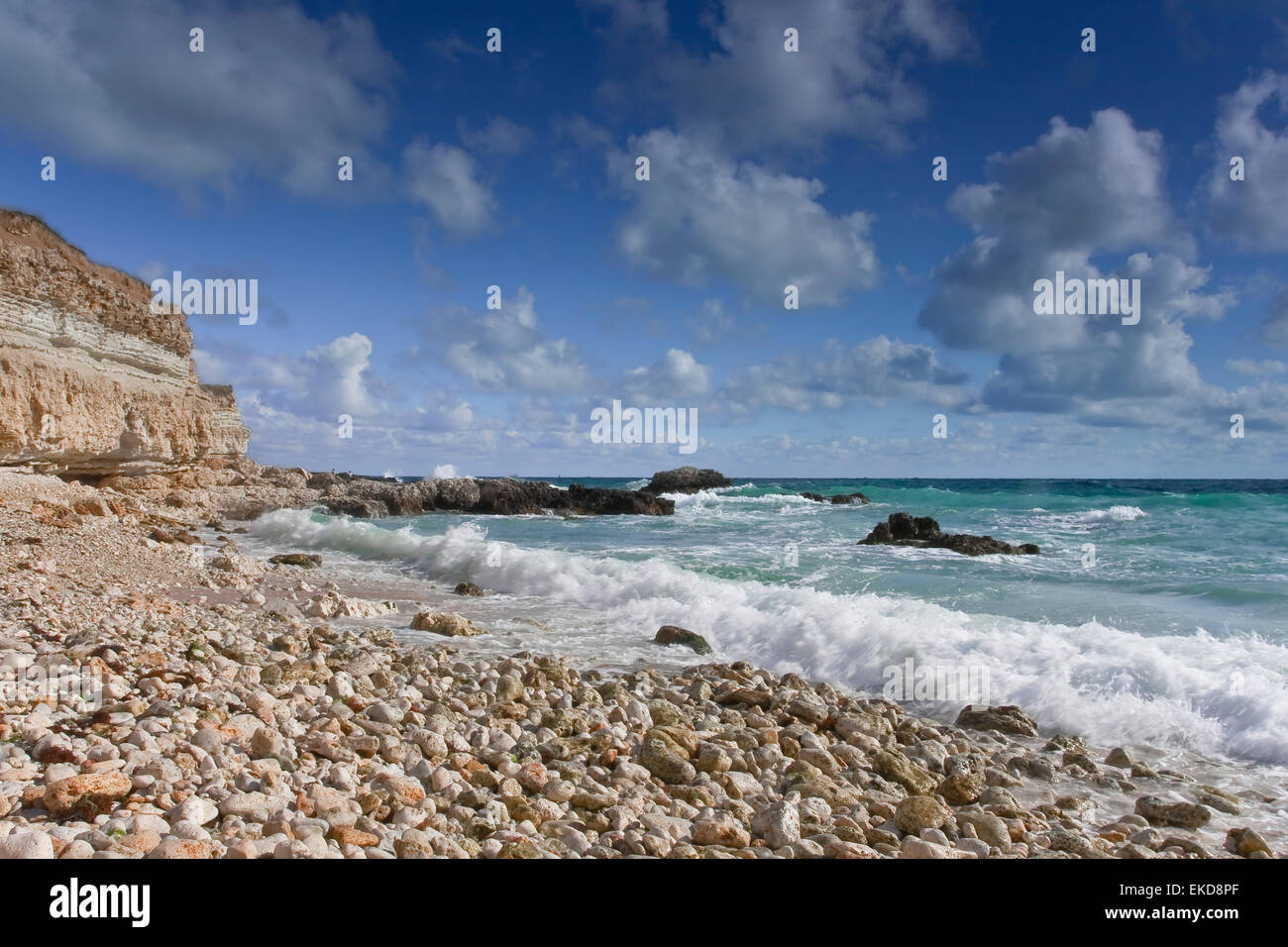 Beautiful rocky sea beach at the sunset Stock Photo - Alamy