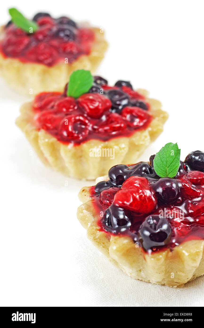 Three fresh blackberry and raspberry cakes Stock Photo - Alamy