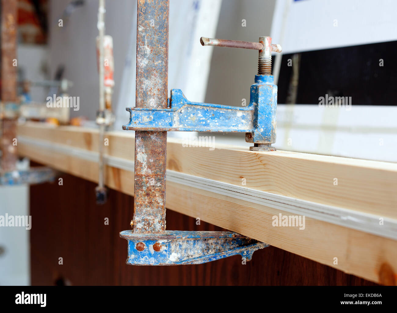 Carpenter screw clamp tool pressing wood slats Stock Photo - Alamy