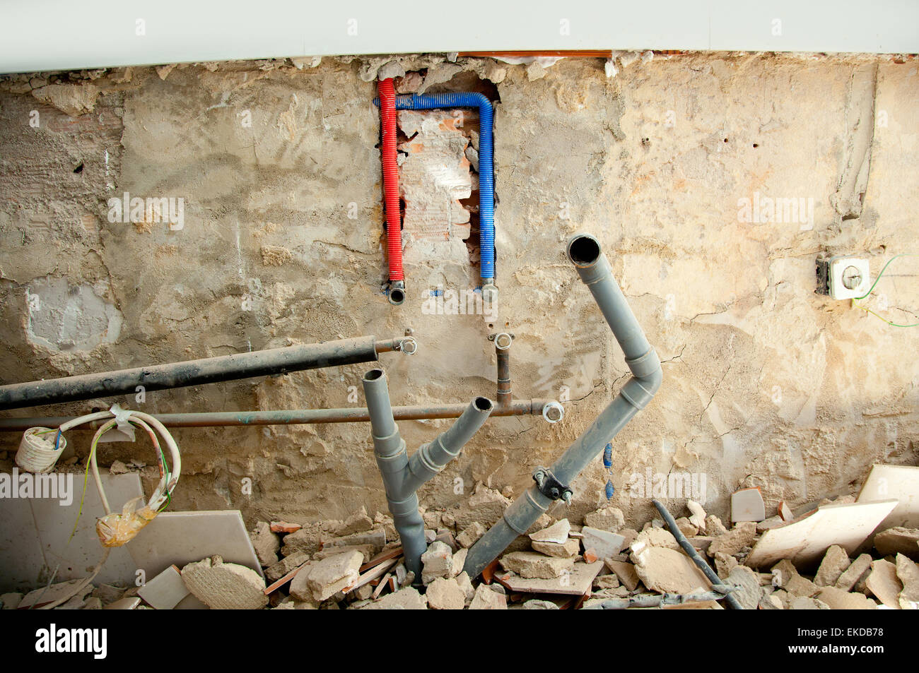 electrical and plumbing installation in kitchen work Stock Photo - Alamy