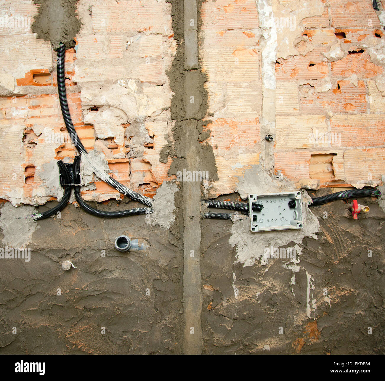 electrical and plumbing installation in kitchen work Stock Photo - Alamy